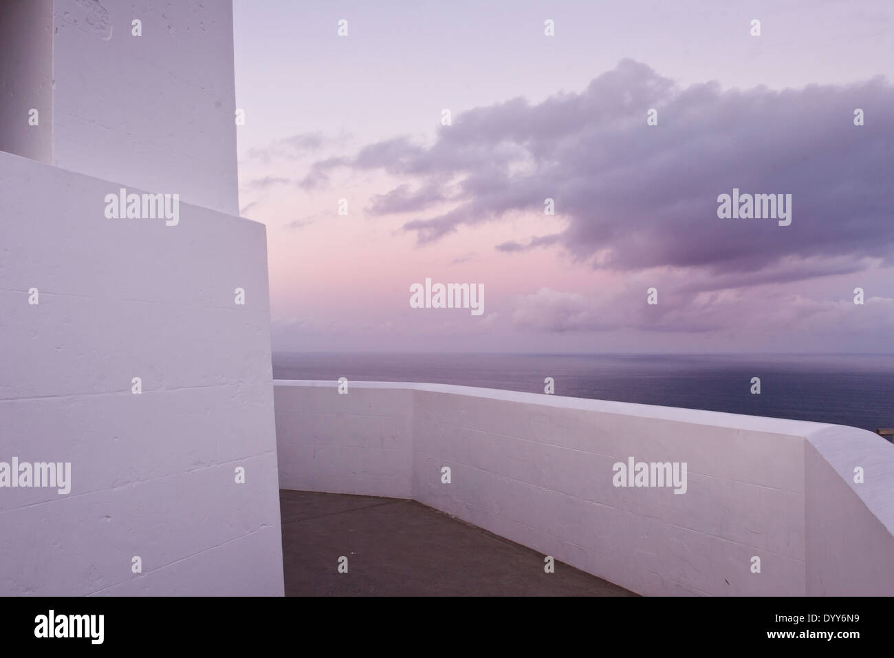 view from top lighthouse walkway across the ocean with a lavender ...