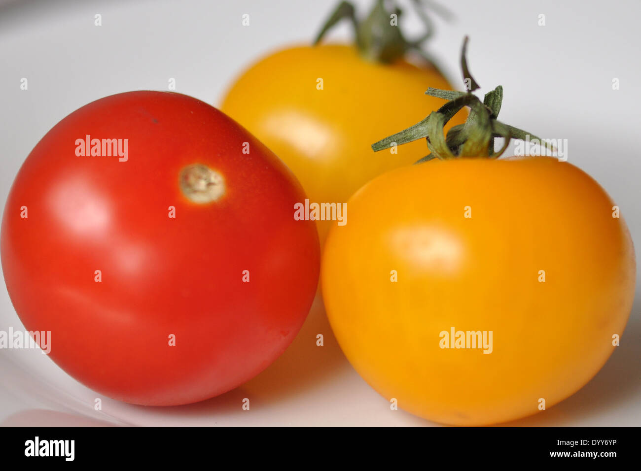 red and yellow tomatoes Stock Photo - Alamy
