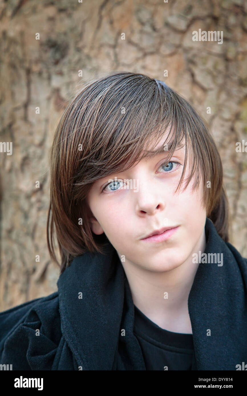 outdoor portrait of a male teenager in front of a tree Stock Photo - Alamy