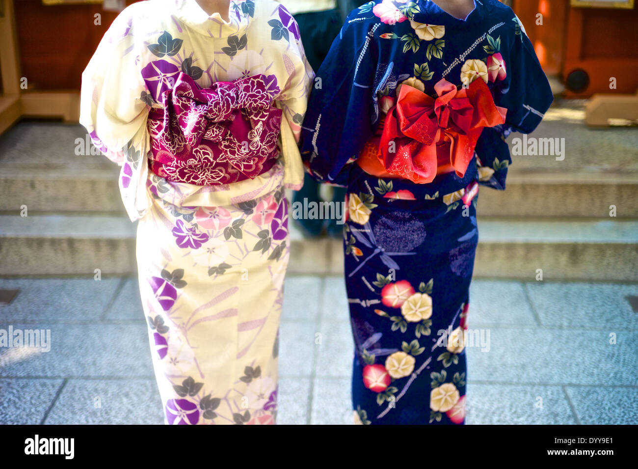 Japanese woman wearing traditional kimonos entering the ¨Love Shrine ...