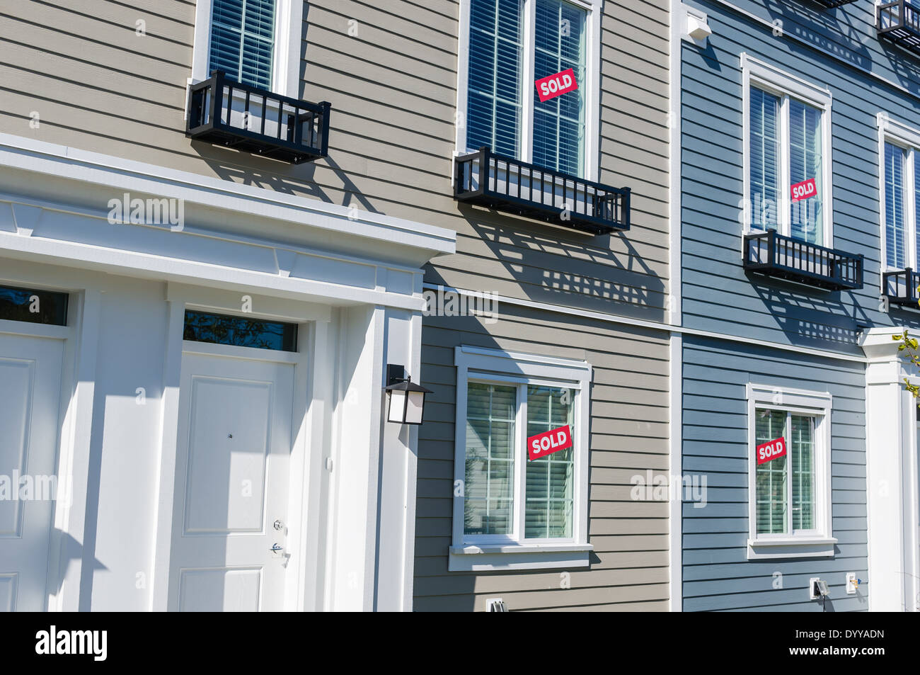 Architectural details of modern apartment building. Sign SOLD in the ...