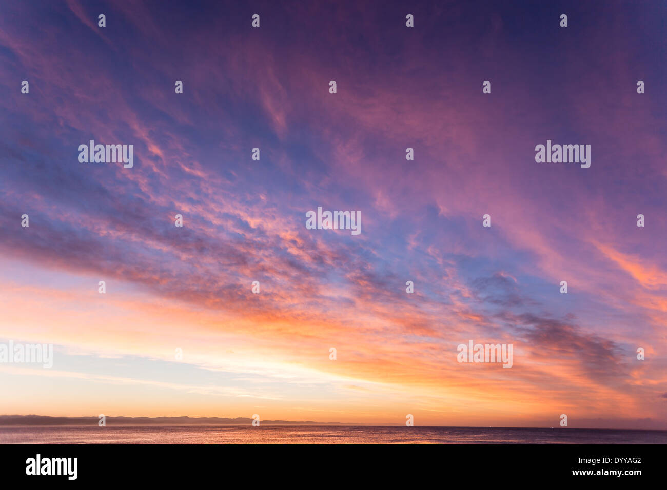 Morning dawn colors of scenic light reflections on beach ocean waters ...