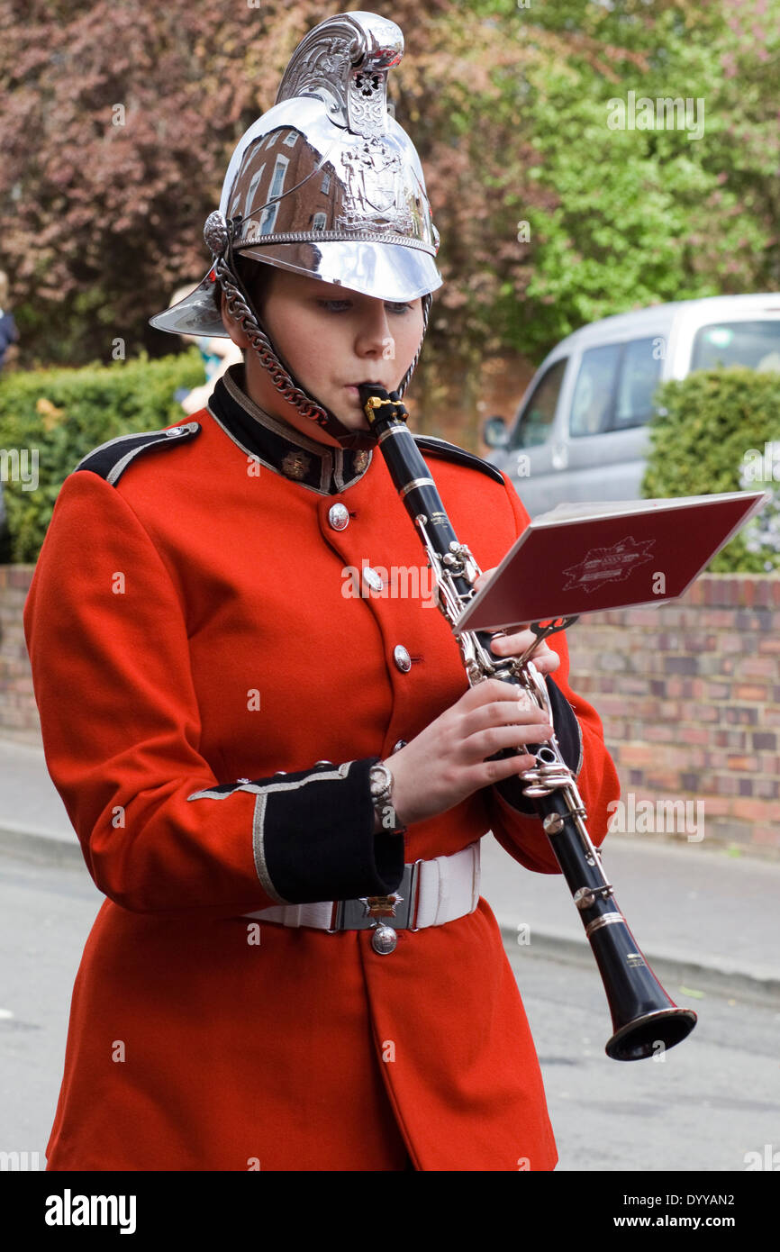 Marching brass band walking down the high street in Stratford upon Avon ...