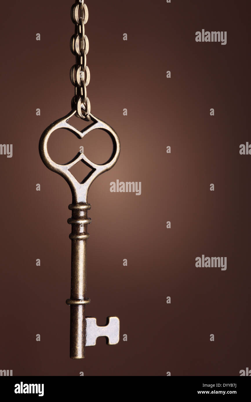 picture of an old keys on a brown background Stock Photo - Alamy