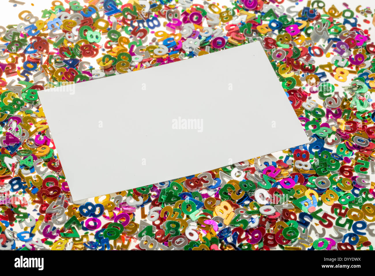 close up of small color numbers confetti and empty card Stock Photo - Alamy