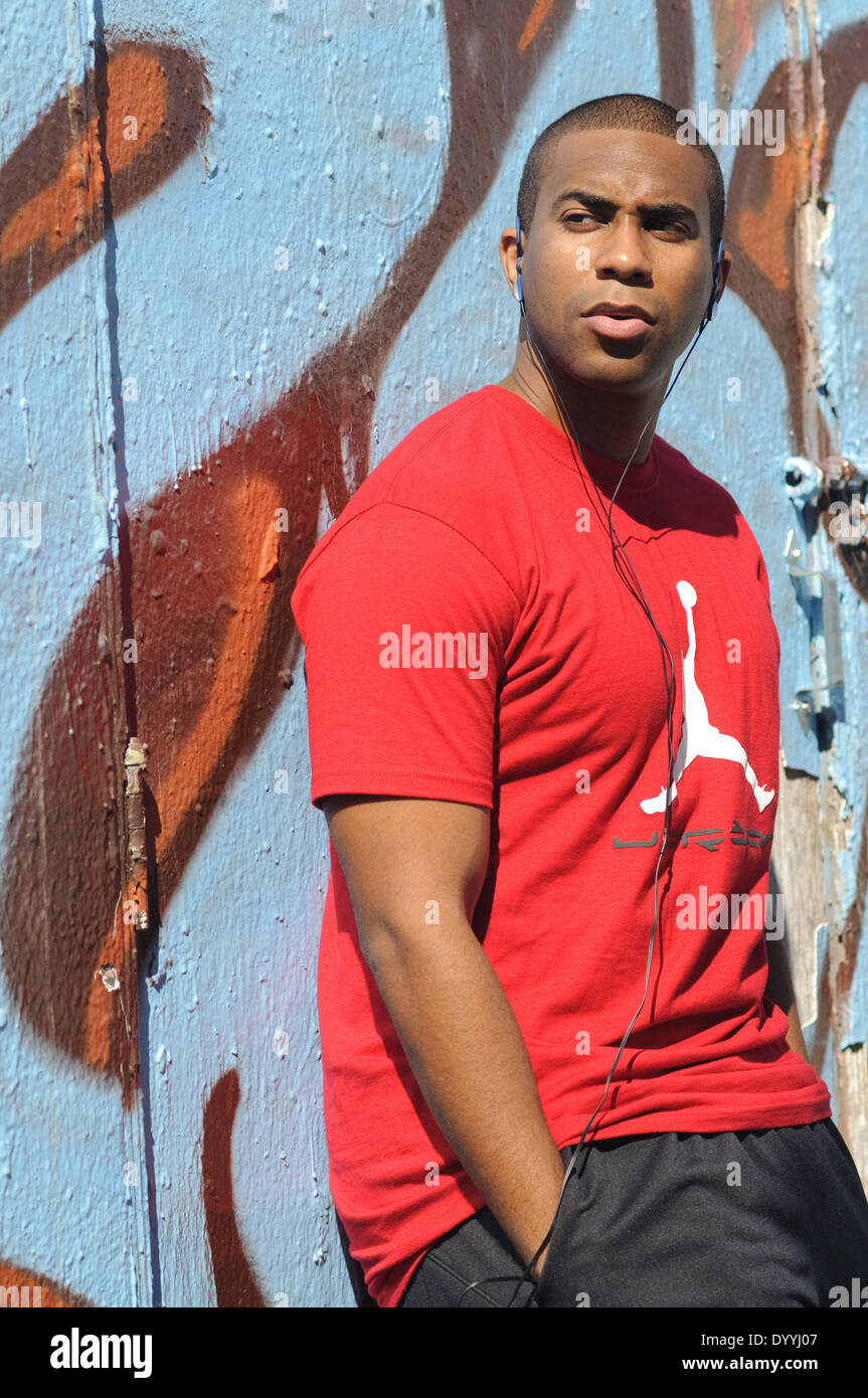 Black coloured colored young man hi-res stock photography and images ...