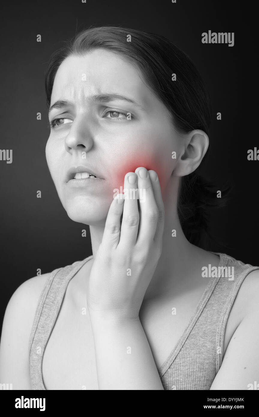 Unhealthy tooth black hand hi-res stock photography and images - Alamy