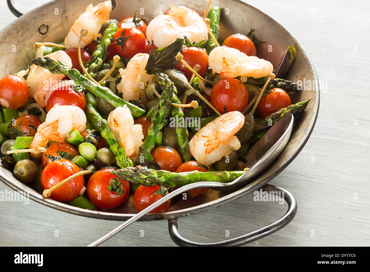 Stir-fried of Shrimps, green asparagus, capers, spring onion and ...