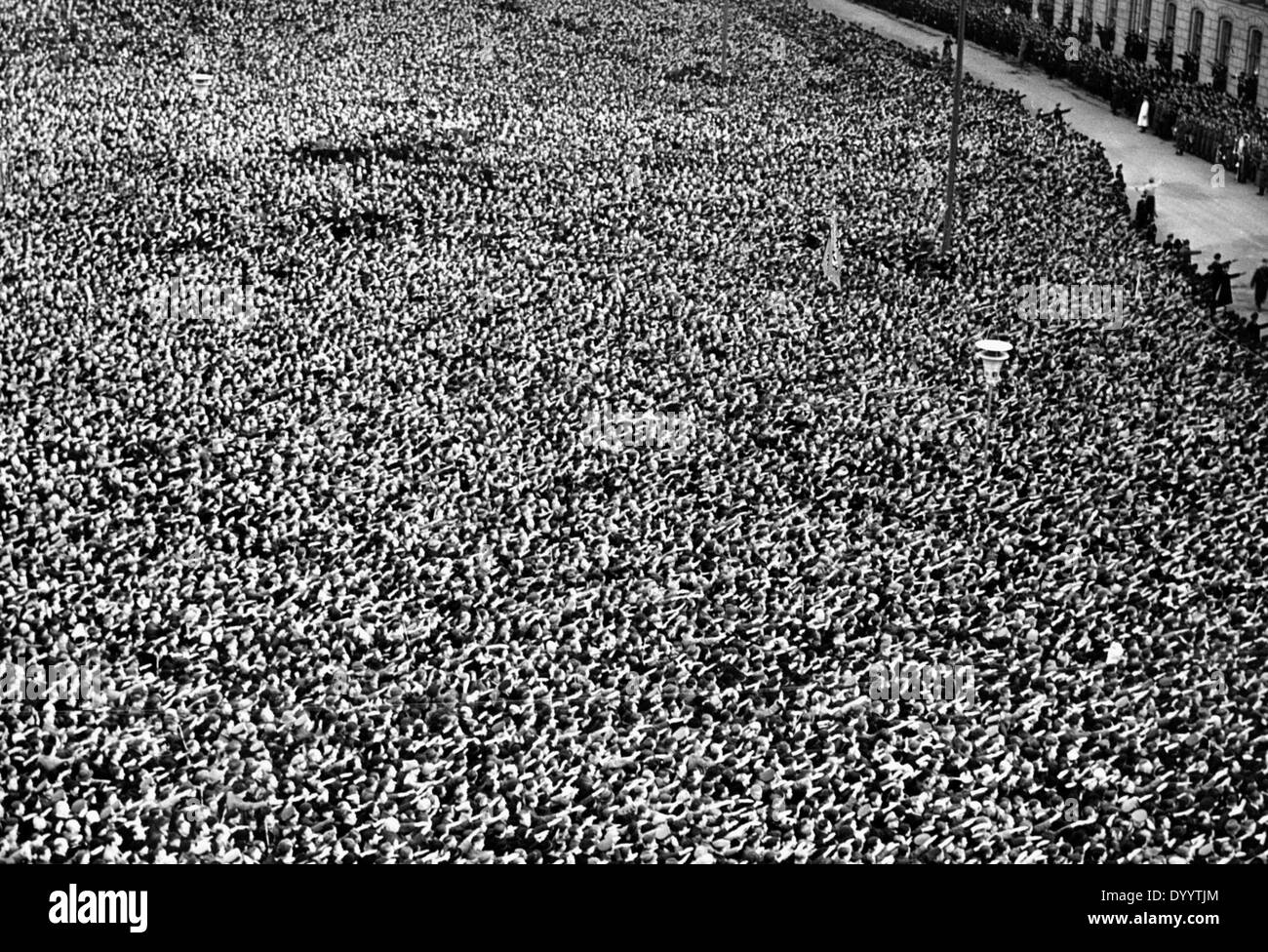 Crowds of people in front of the Reich Chancellery after the annexation ...