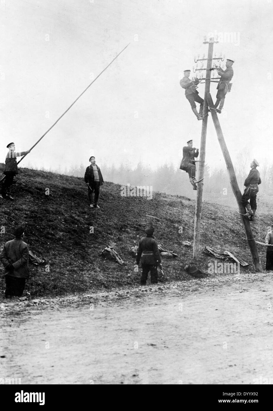 German soldiers re-construct a telegraph line, 1914 Stock Photo - Alamy