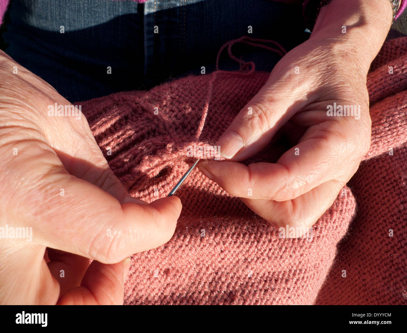 Woman with needle hi-res stock photography and images - Alamy