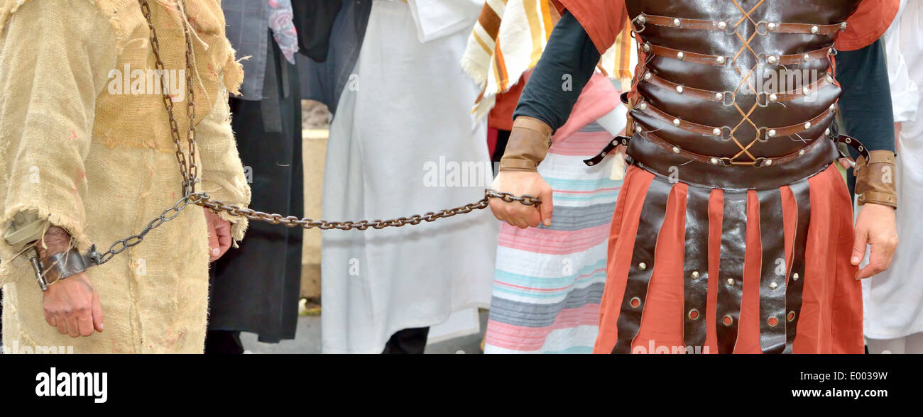 Jesus Christ chained to a Roman soldier Stock Photo - Alamy