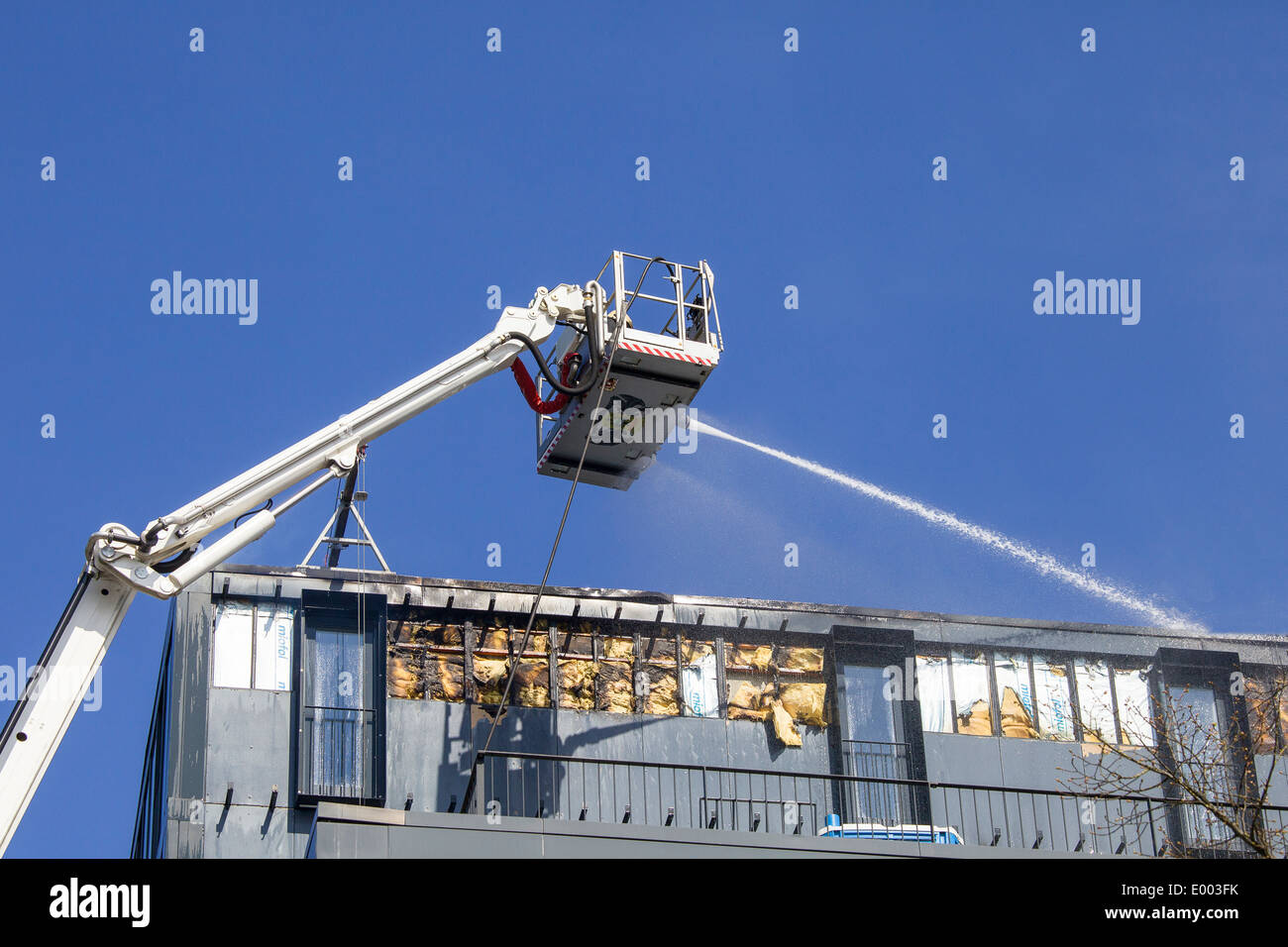 Fireman burning hose fire hi-res stock photography and images - Alamy