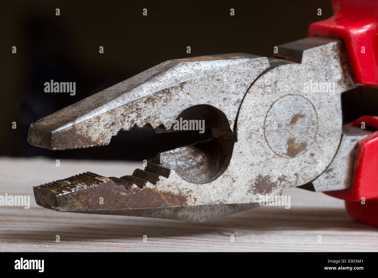 detail of combination pliers with dark background Stock Photo - Alamy