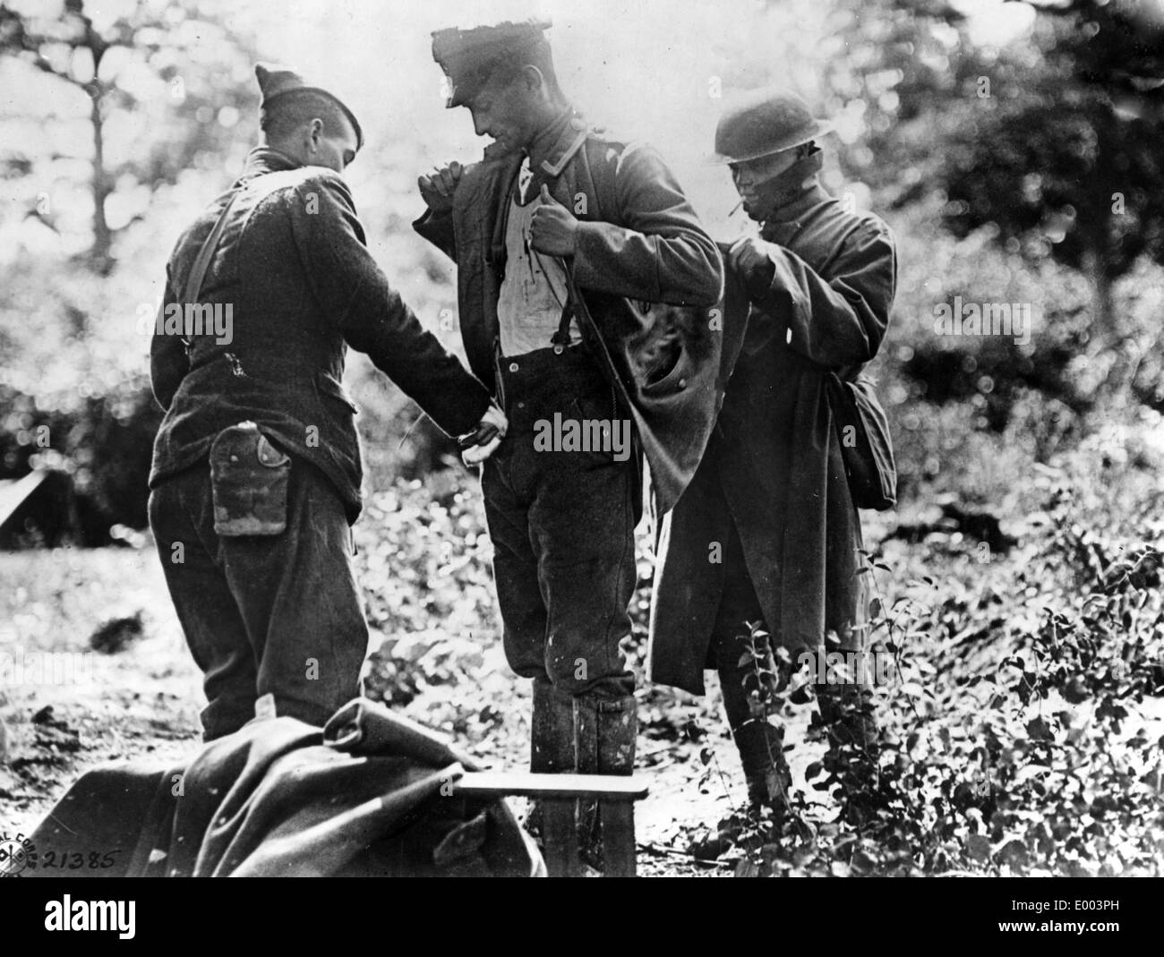 Inspection of a German prisoner, 1918 Stock Photo - Alamy