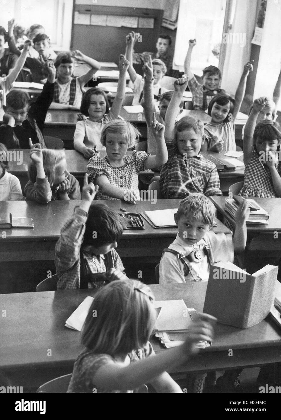 School children boy girl learning Black and White Stock Photos & Images ...