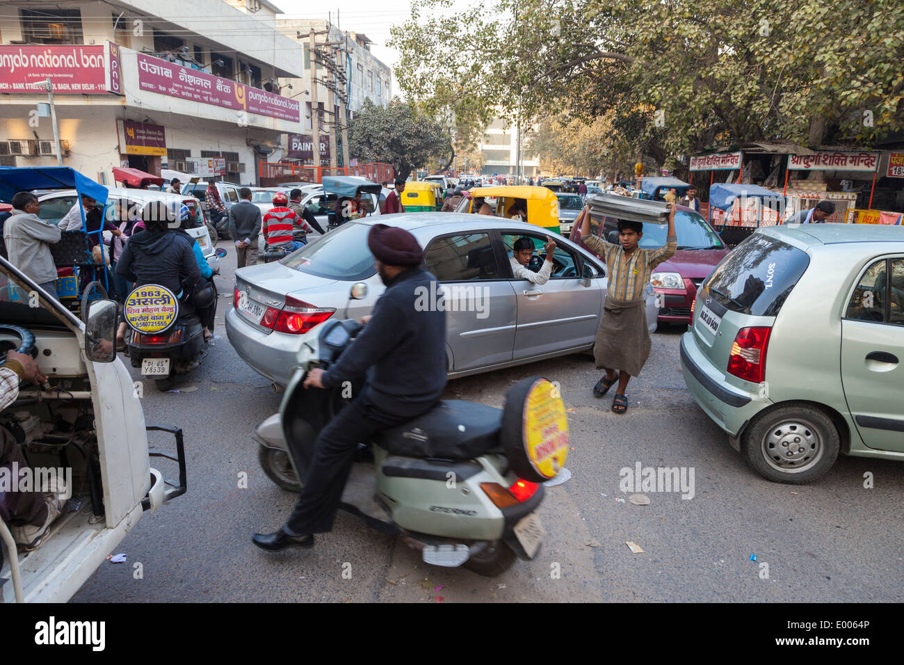 New Delhi, India. Vehicular and Pedestrian Traffic on a Busy Downtown ...