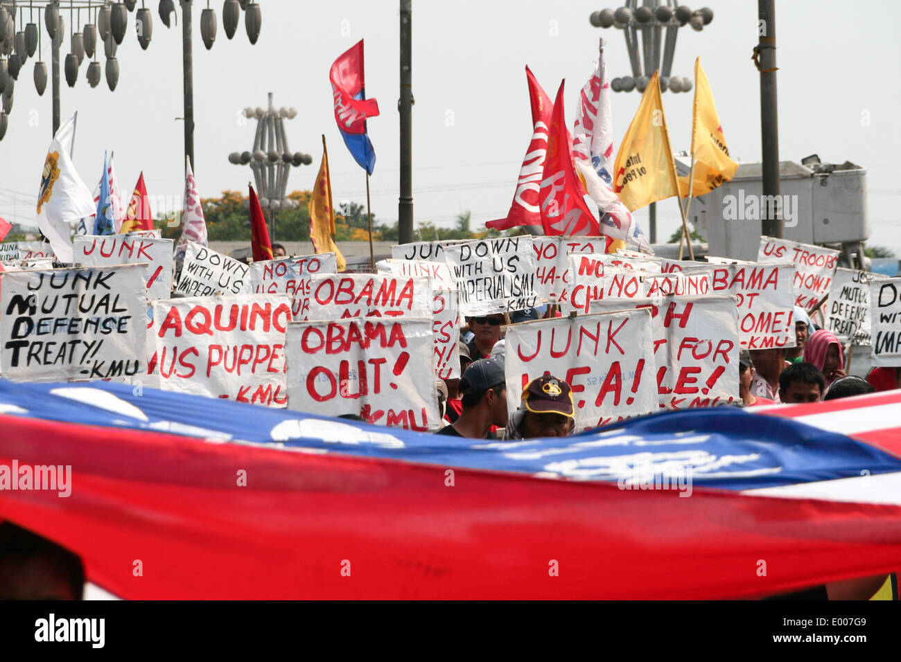 Manila, Philippines. 28th April, 2014. Different banners from different ...