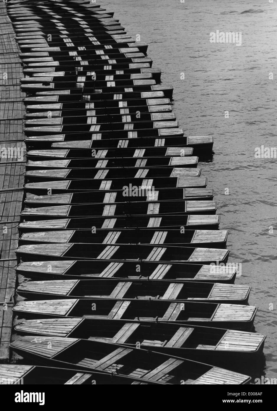 Boats on banks river Black and White Stock Photos & Images - Alamy