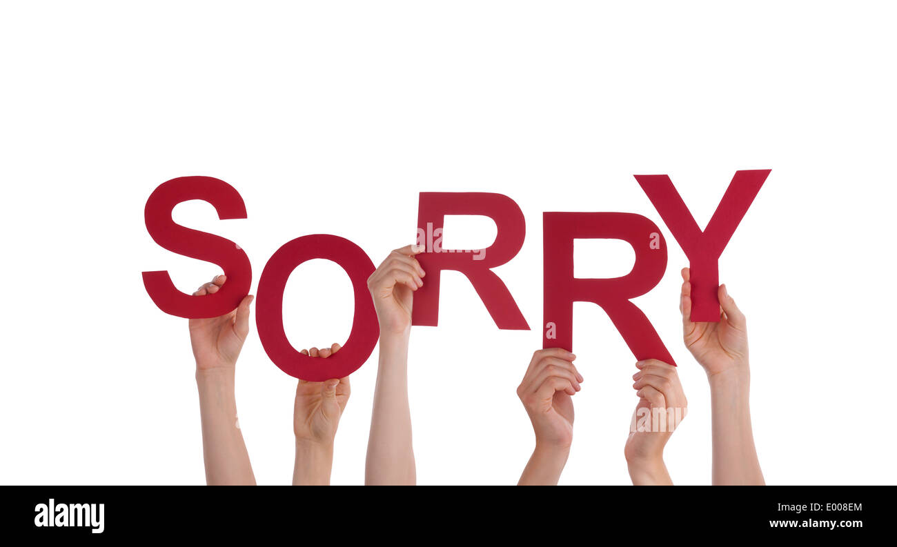 Many Hands Holding the Red Word Sorry, Isolated Stock Photo - Alamy