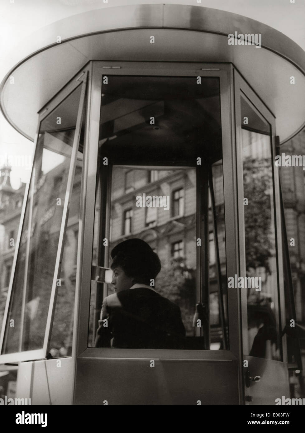 A ticket agent in her booth in Switzerland Stock Photo - Alamy