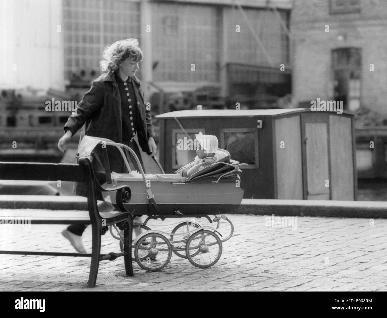 Woman walking about in the city Black and White Stock Photos & Images ...