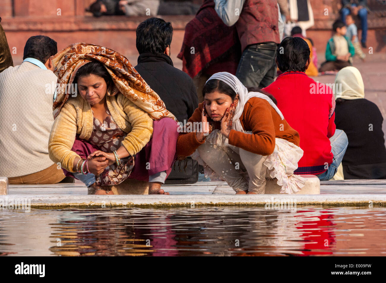 New Delhi, India. Muslim Women Performing Ablutions before Prayers ...