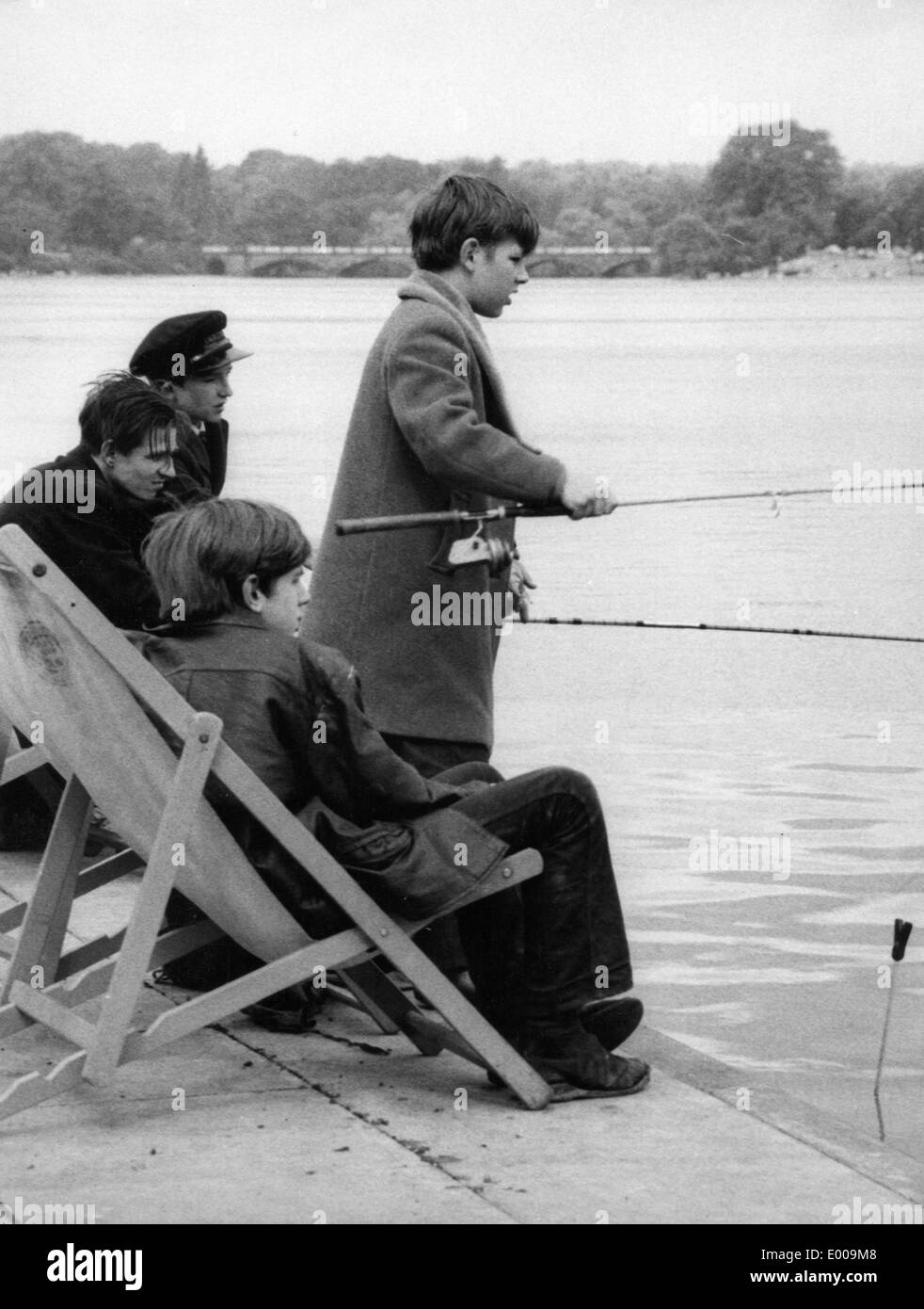 Boy fishing pole Black and White Stock Photos & Images - Alamy