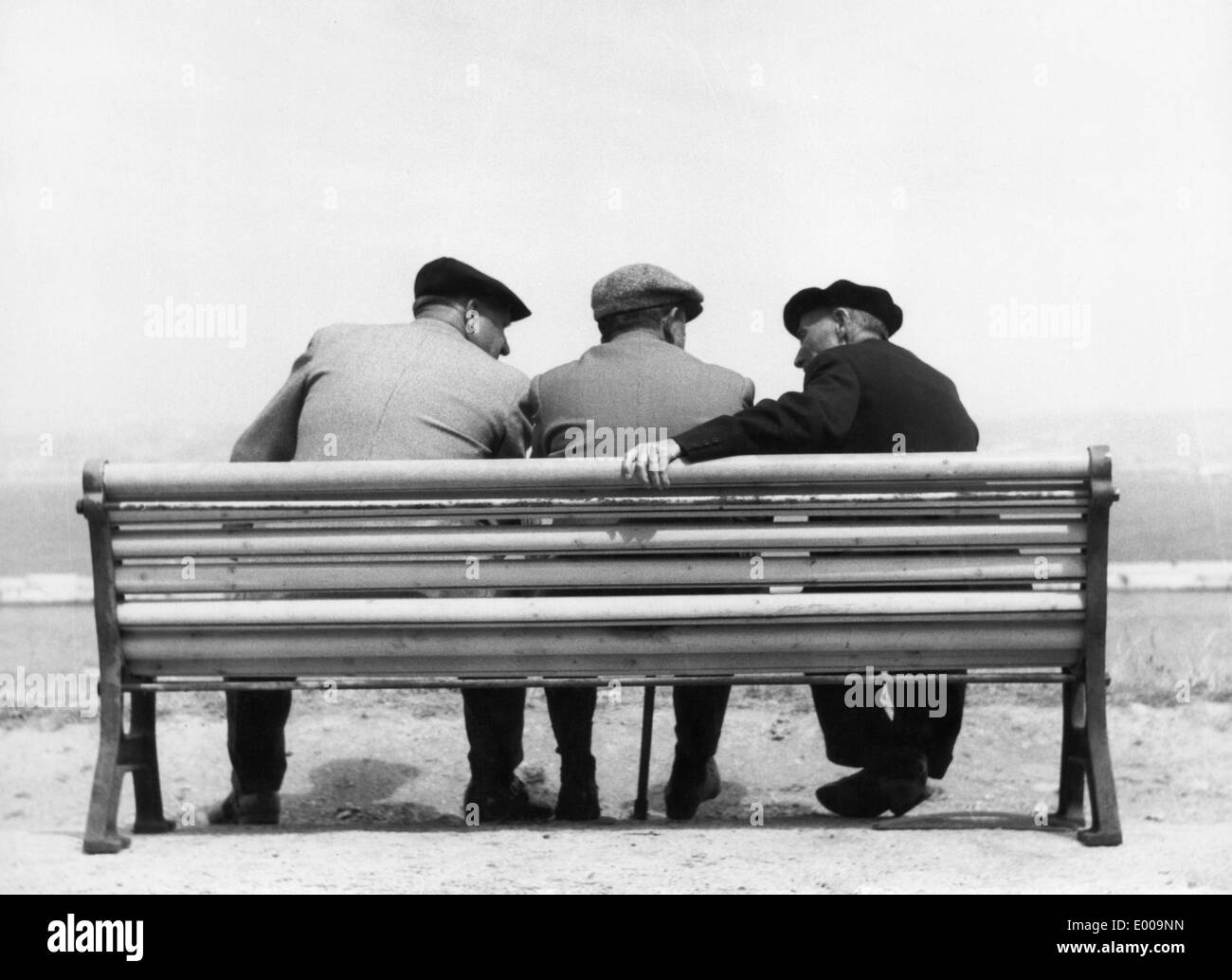 Old men sitting bench Black and White Stock Photos & Images - Alamy