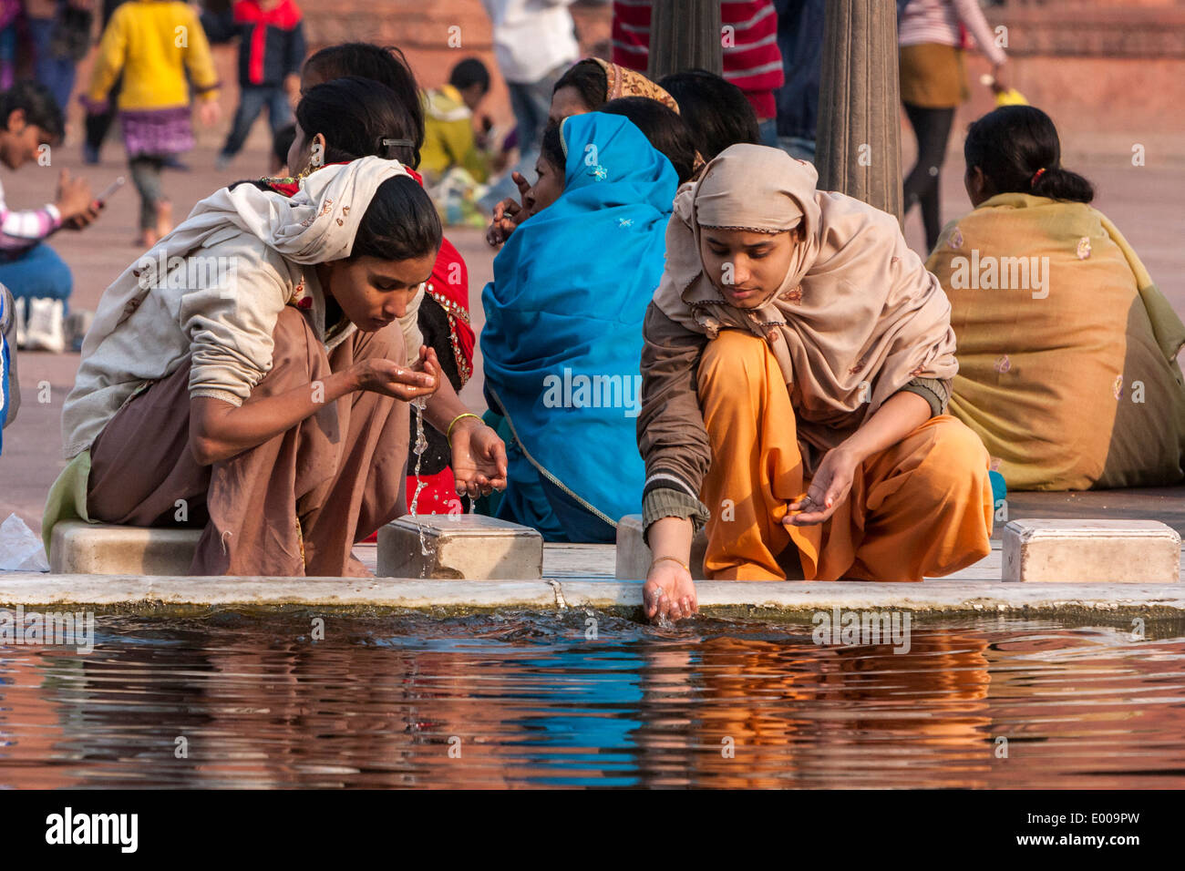 New Delhi, India. Muslim Women Performing Ablutions before Prayers ...