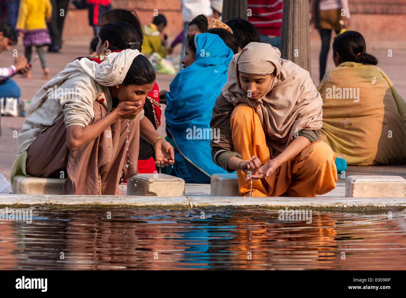 New Delhi, India. Muslim Women Performing Ablutions before Prayers ...