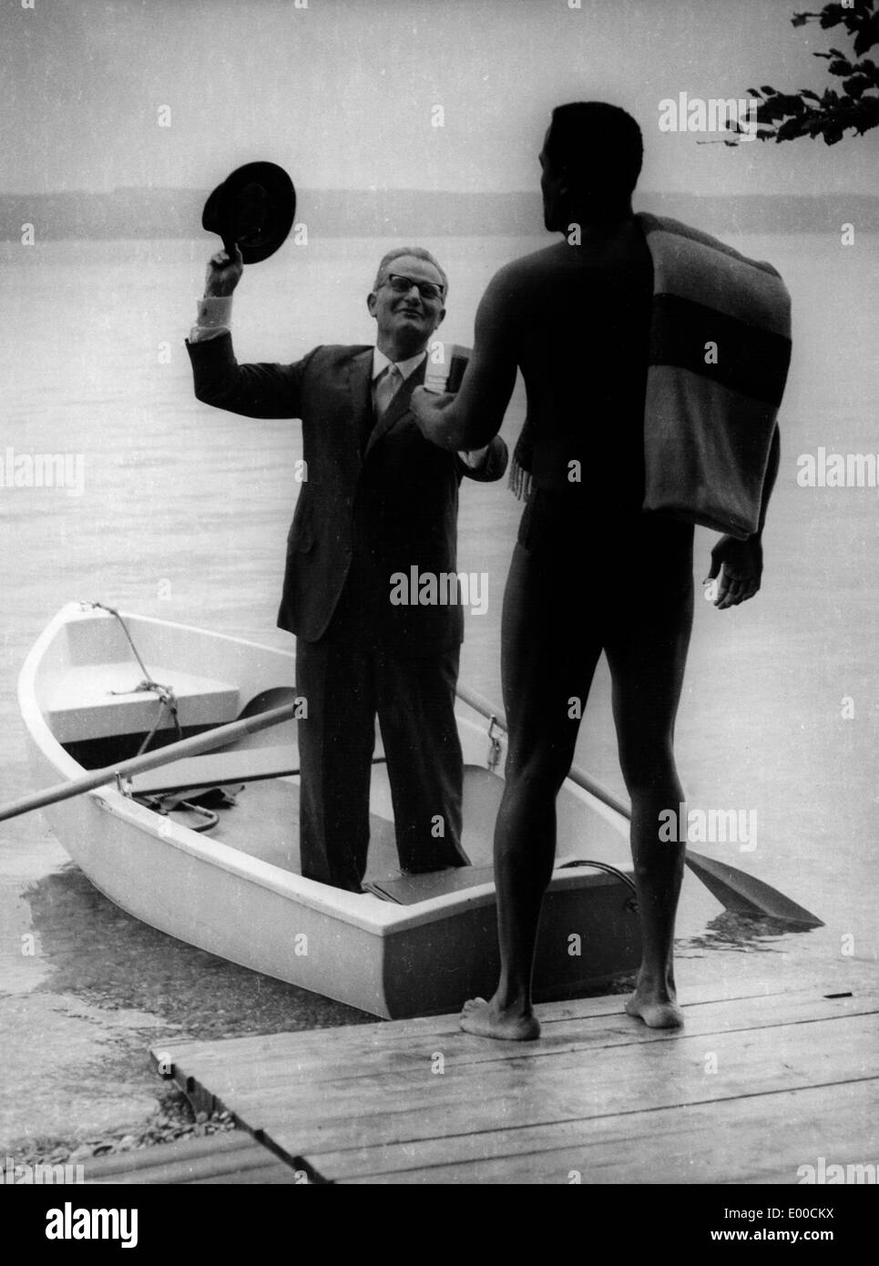 Men in row boat Black and White Stock Photos & Images - Alamy