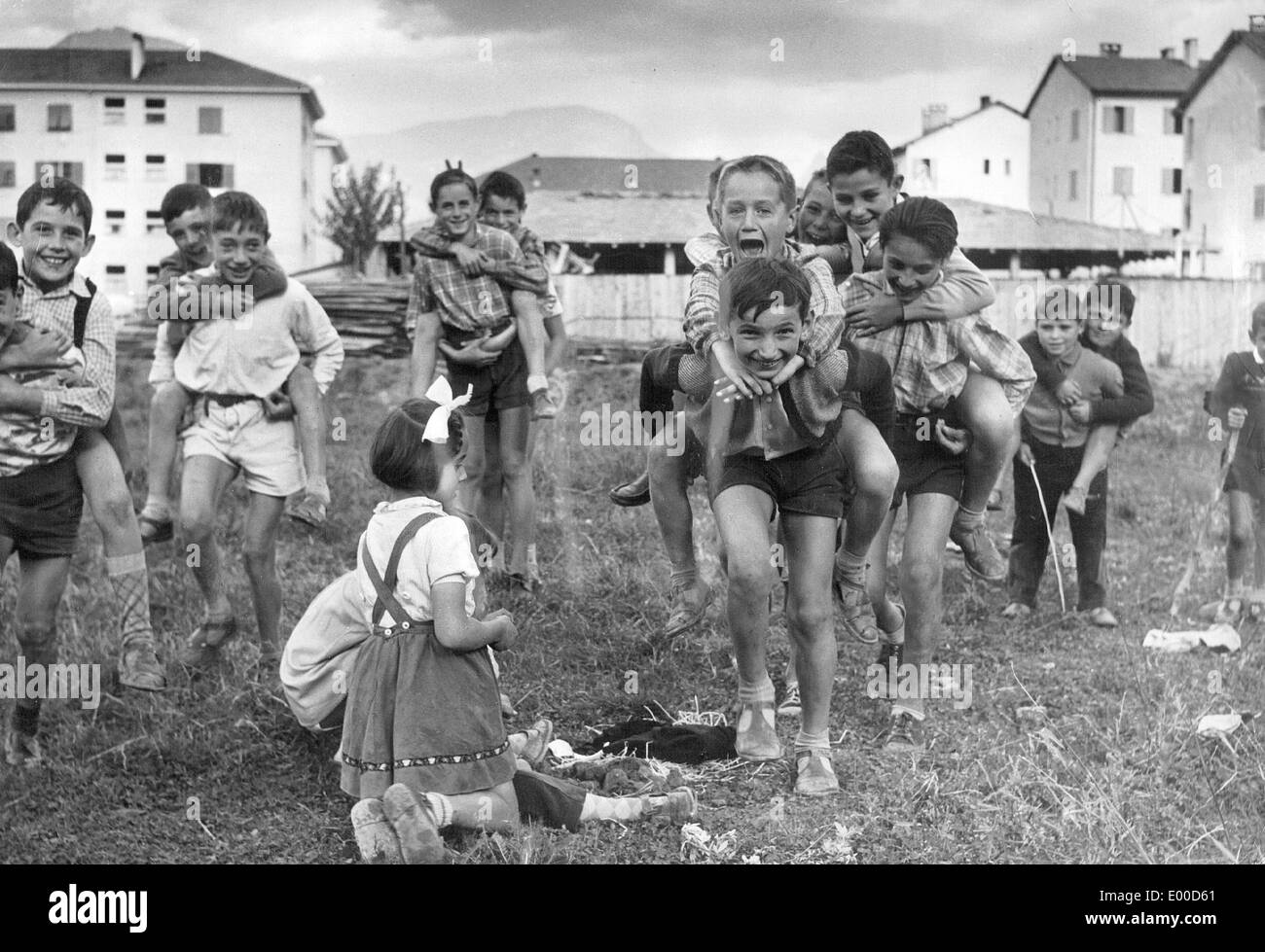 Children playing in residential Black and White Stock Photos & Images ...