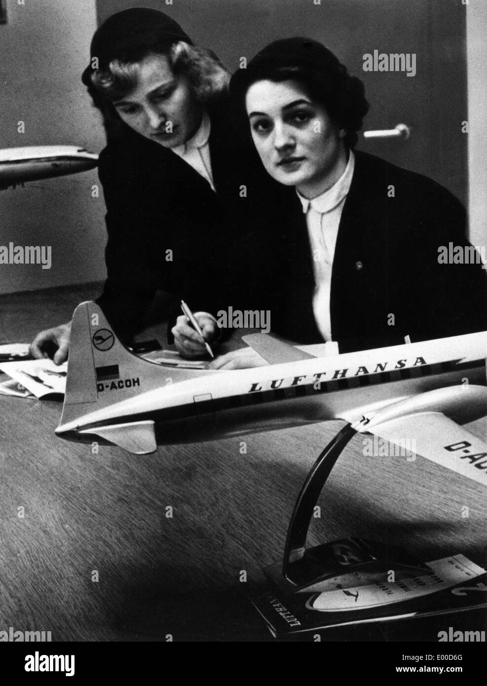 Stewardesses airplane hi-res stock photography and images - Alamy