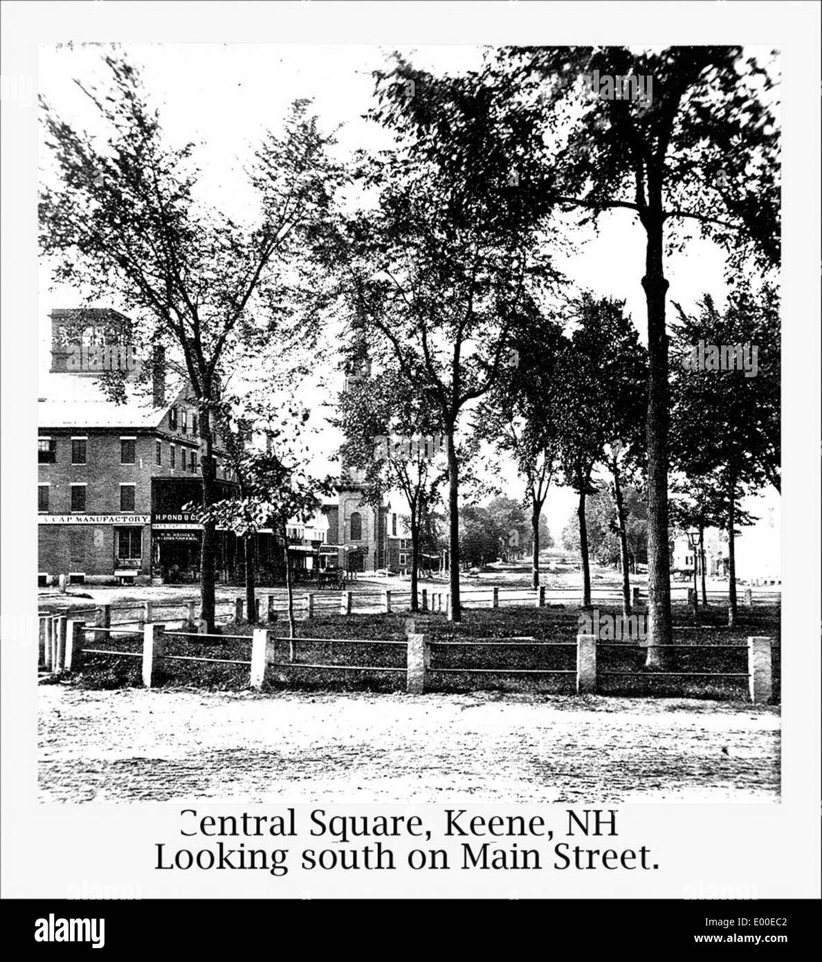 This historical photograph captures the view southward down Main Street ...