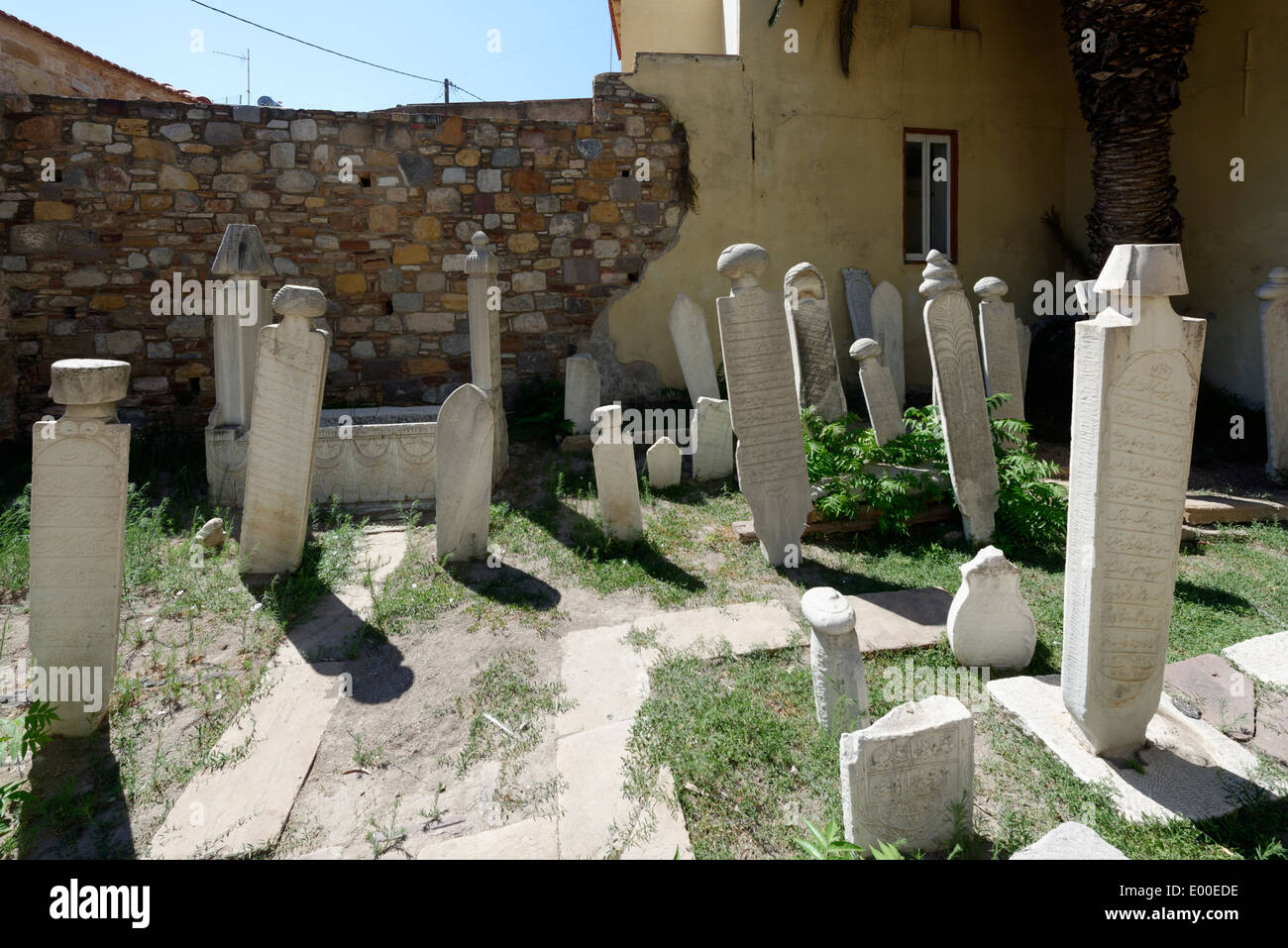 Ottoman Turkish cemetery with marble gravestones Castle fortress Kastro ...