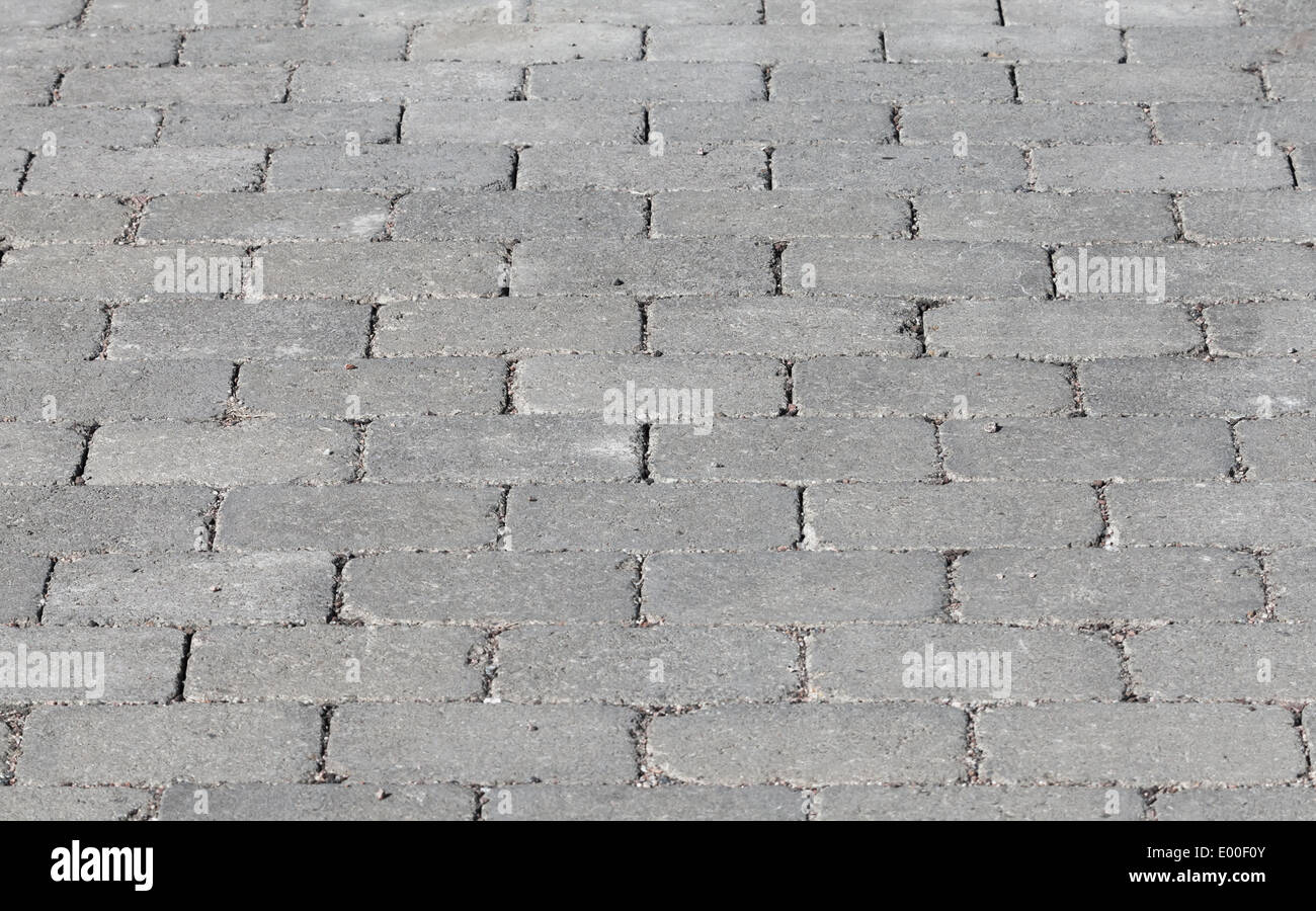 Gray street brick pavement background texture Stock Photo - Alamy