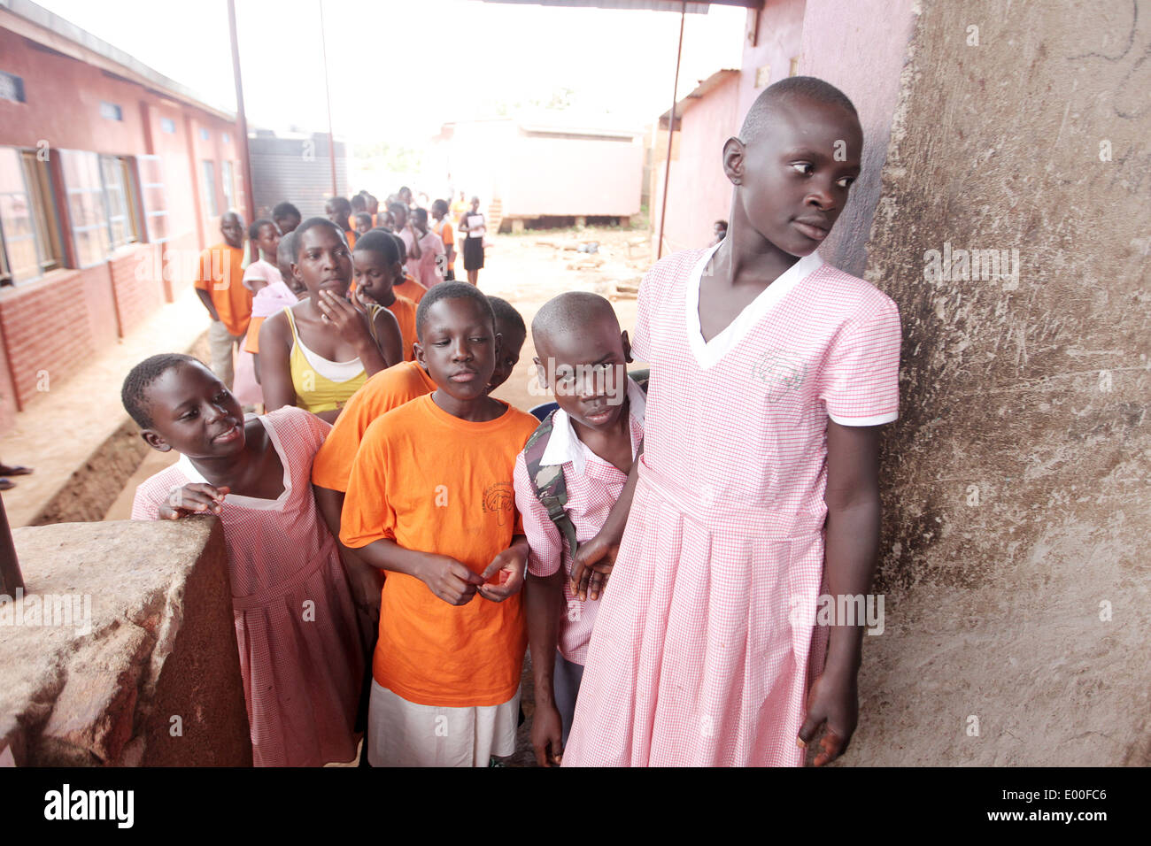 School children line up for their lunch at the NGO funded Treasured ...