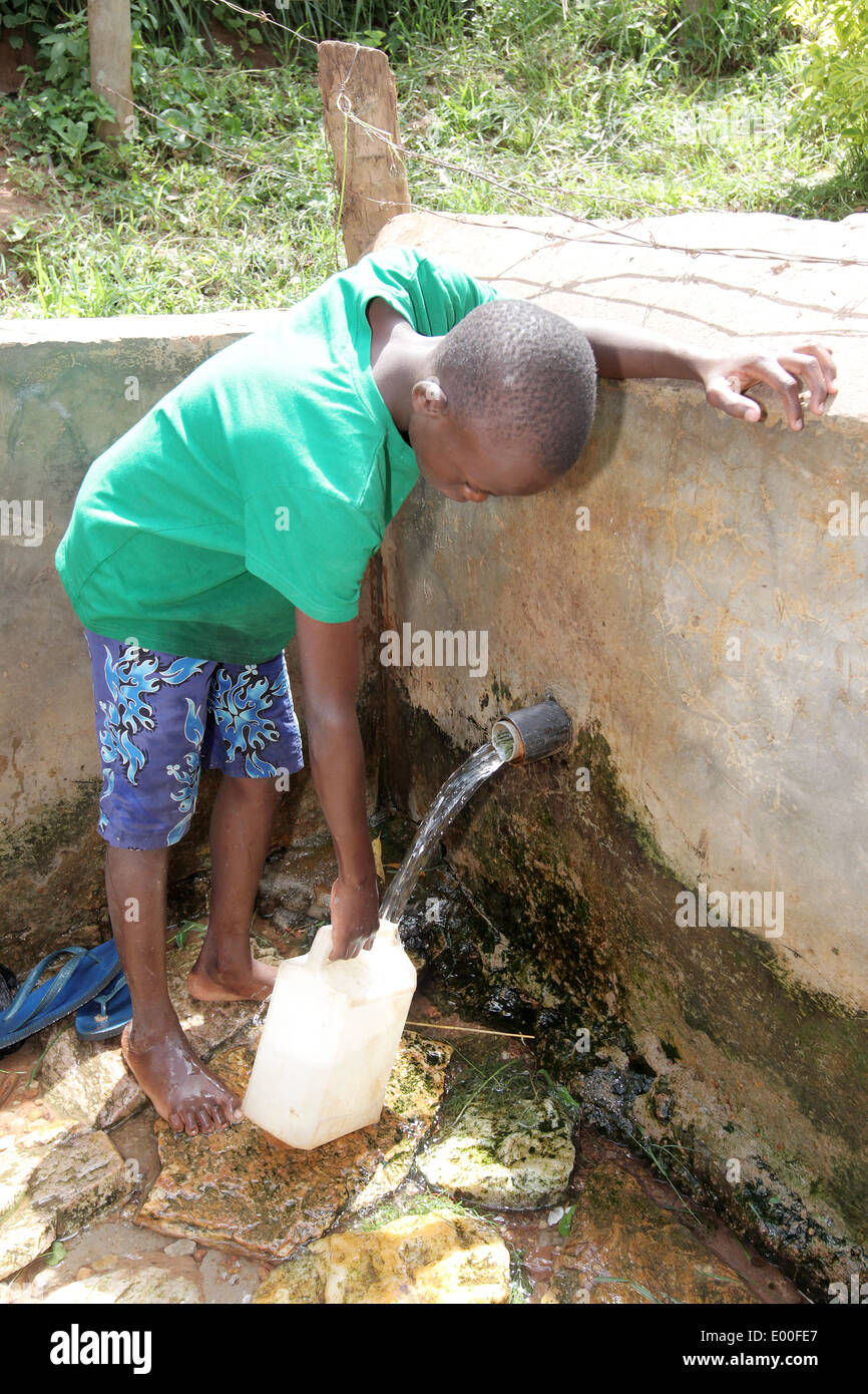 Collecting dirty water africa hi-res stock photography and images - Alamy