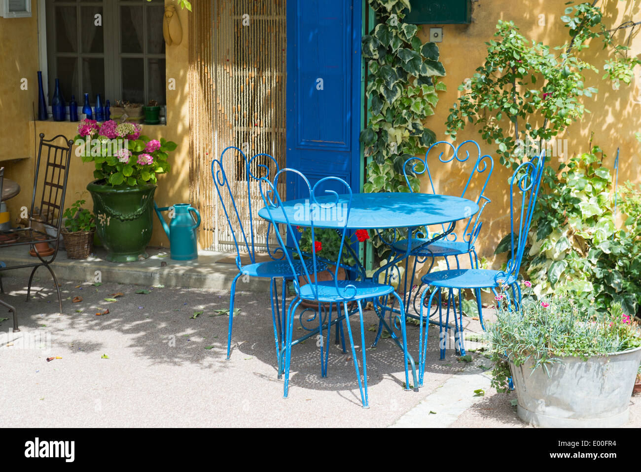 Seats and table at French terrace outdoor Stock Photo - Alamy