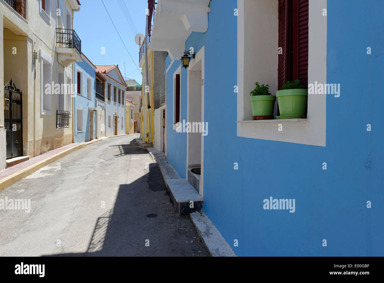 Narrow lane with colourful restored stone homes in Castle fortress ...