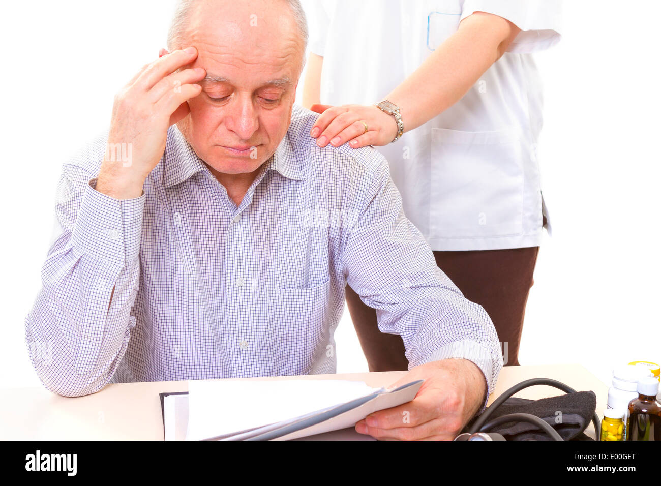 doctor comforting mature stressed patient with headache Stock Photo - Alamy