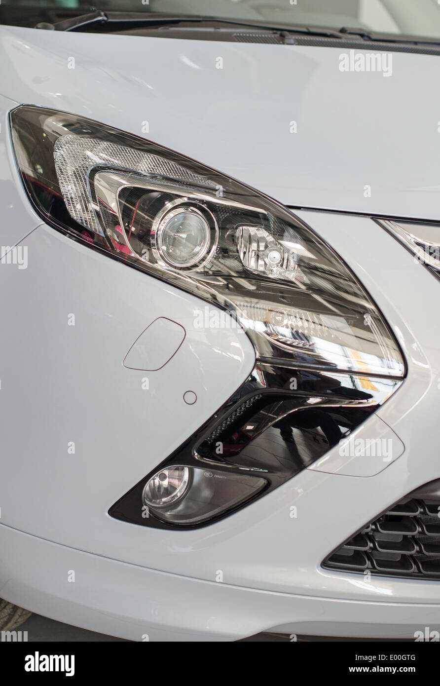 Car headlamp. Part of car at dealership salon Stock Photo - Alamy
