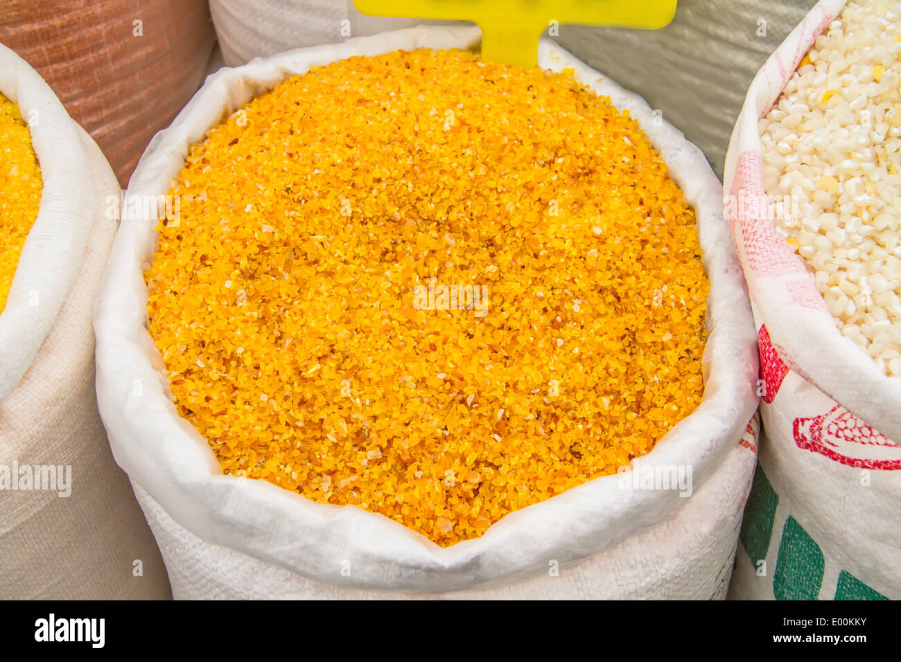 Organic Dry Cracked Corn Kernels In Sacks At A Street Market Stock ...