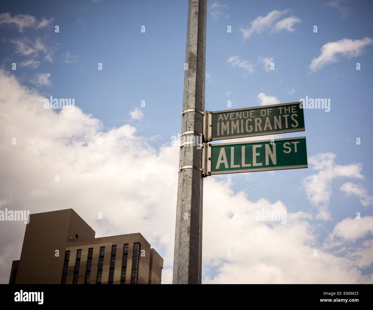 A street sign on Allen Street in New York commemorates the immigrant ...