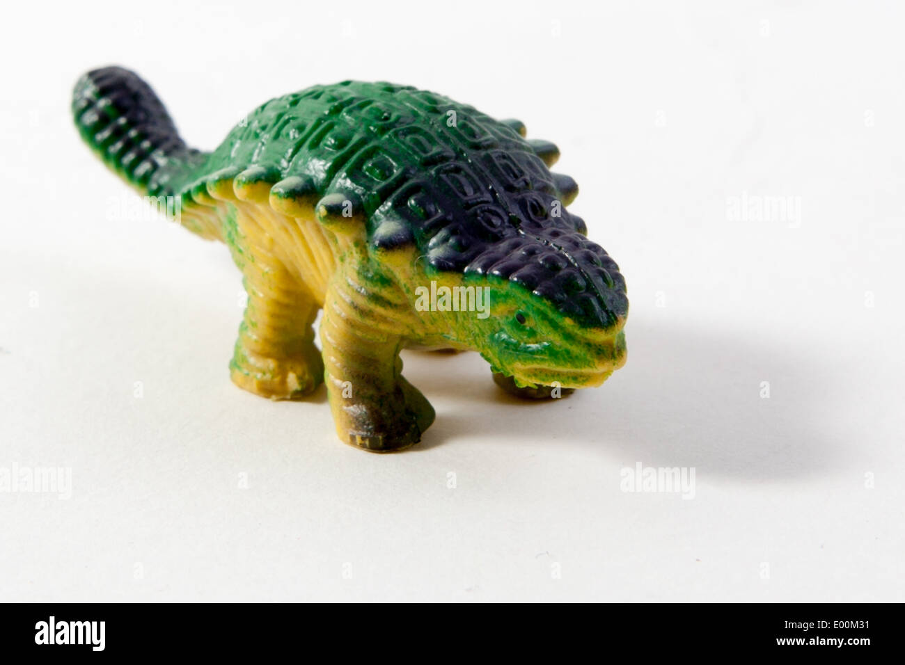 Plastic toys and figures from a play set, dinosaurs, farm animals and ...