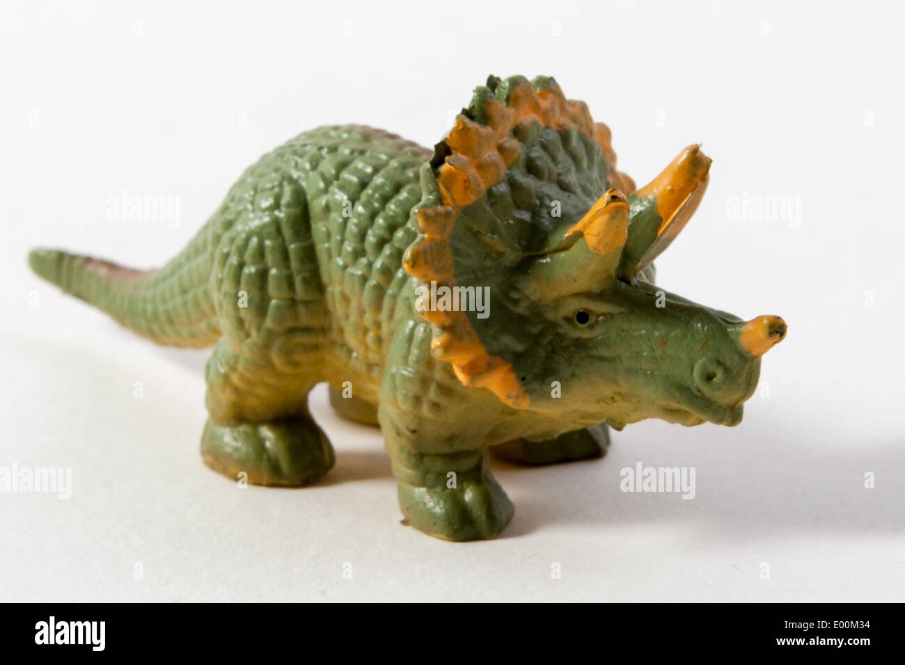 Plastic toys and figures from a play set, dinosaurs, farm animals and ...