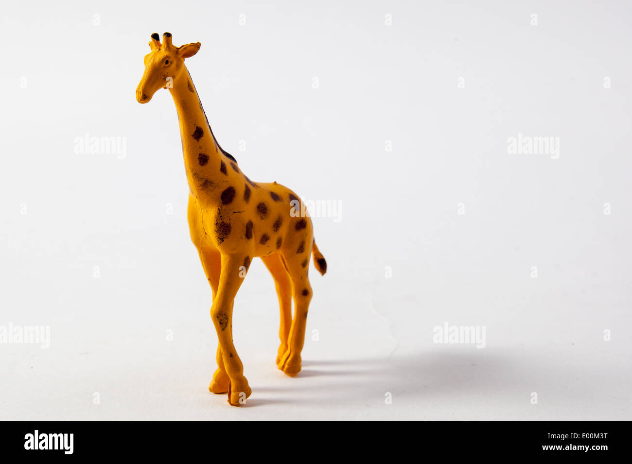 Plastic toys and figures from a play set, dinosaurs, farm animals and ...