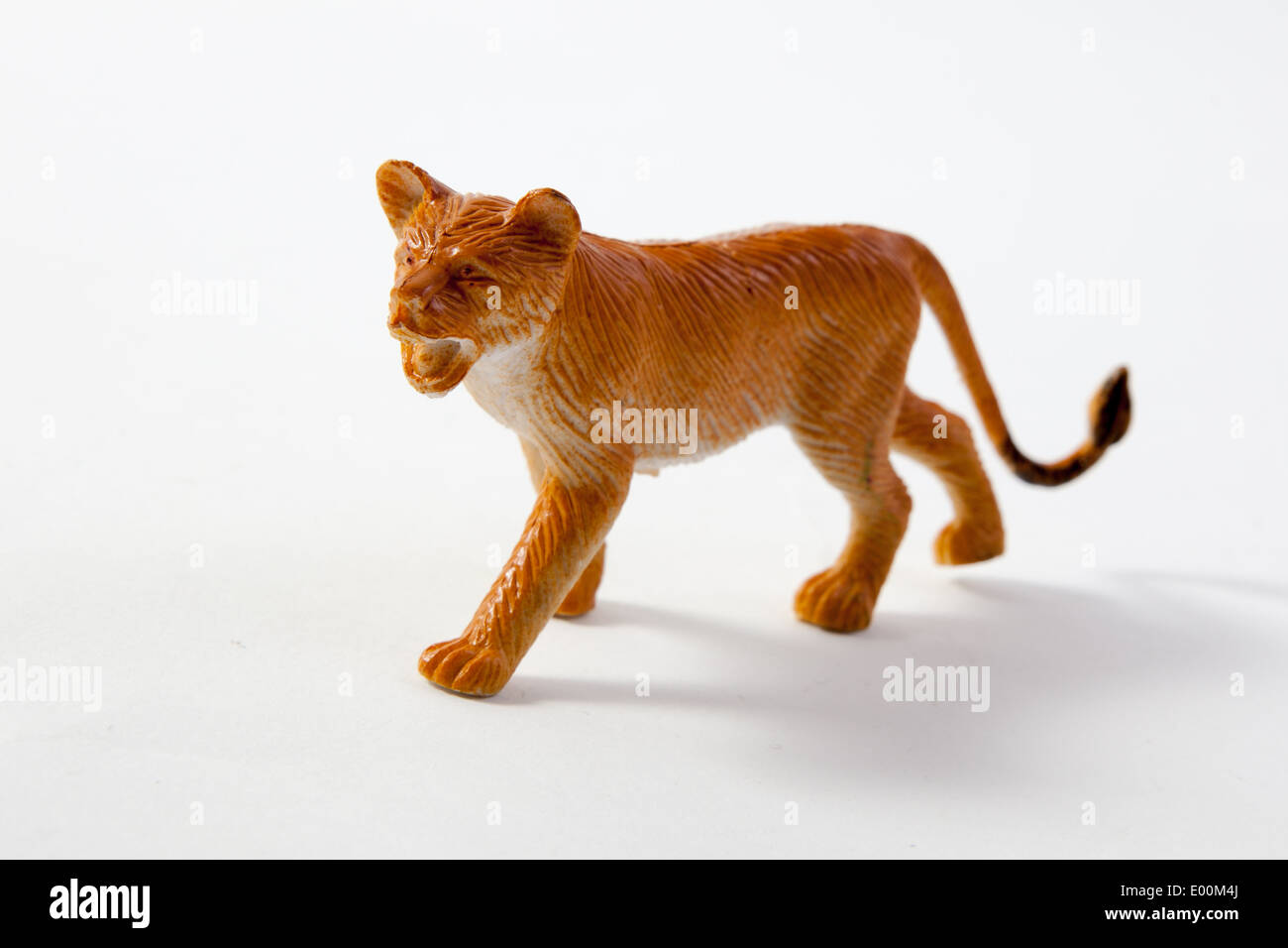 Plastic toys and figures from a play set, dinosaurs, farm animals and ...