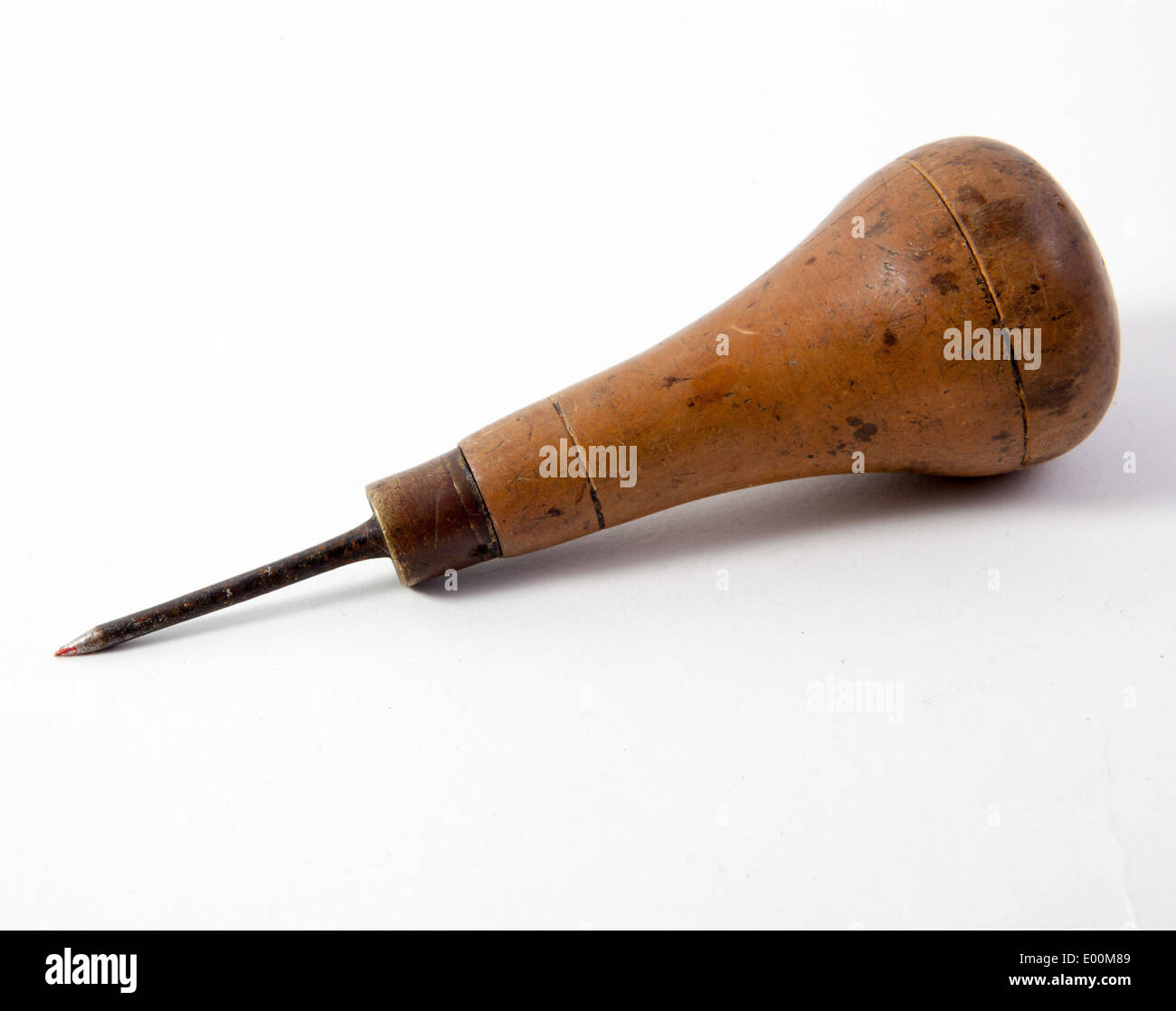 A wooden handled bradawl on a white background Stock Photo - Alamy